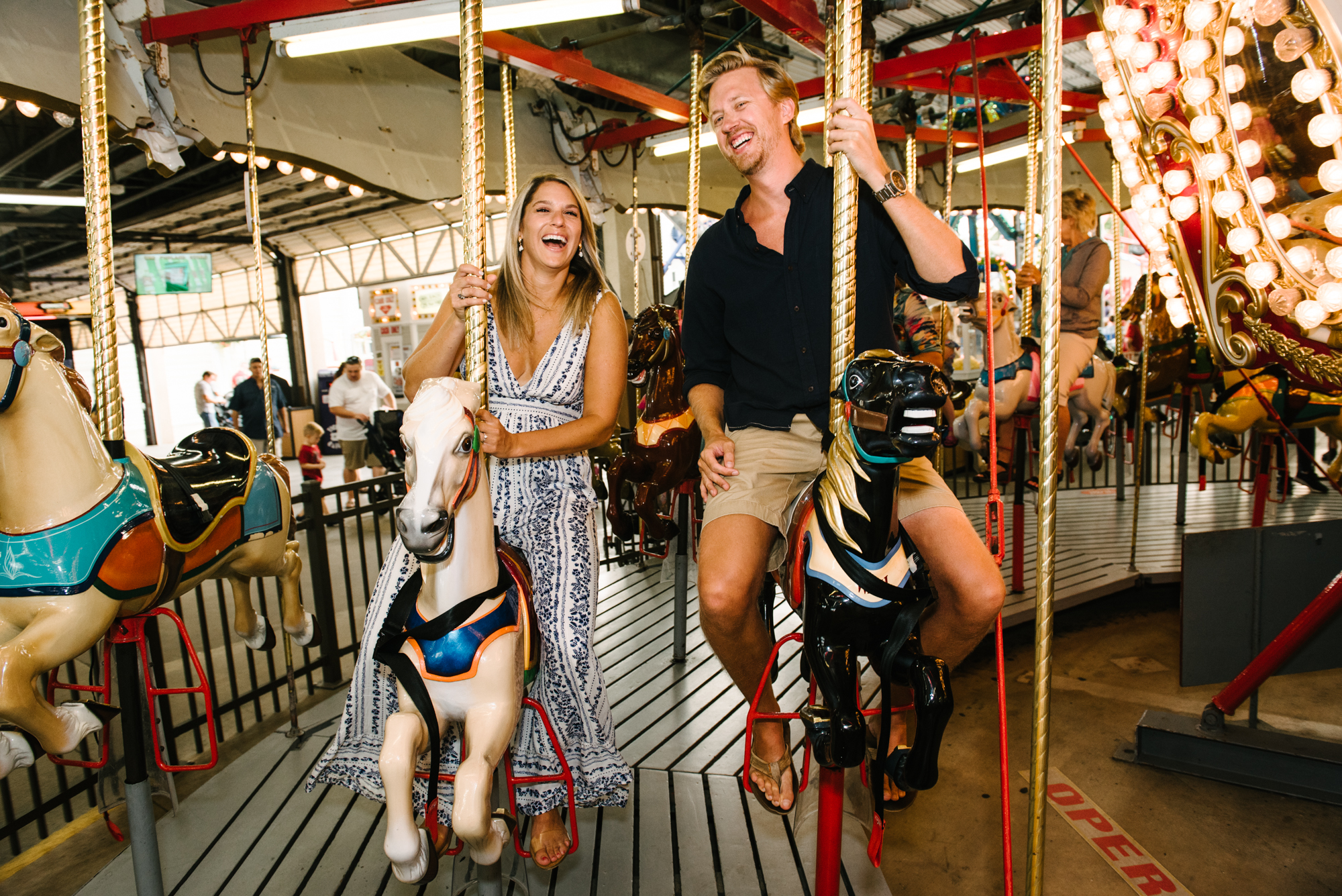 Rehoboth Beach Boardwalk Engagement Session | Chelsea + Conway ...