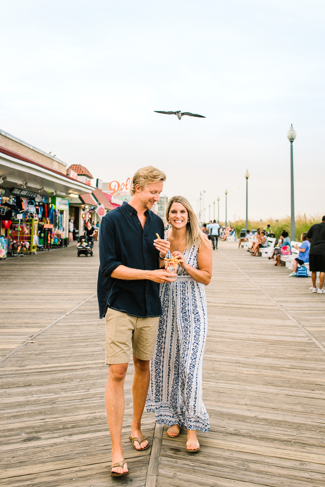 Rehoboth Beach Boardwalk Engagement Session | Chelsea + Conway ...